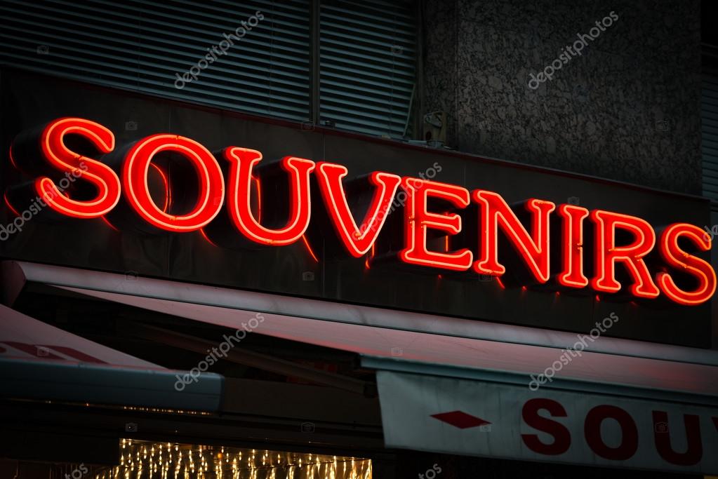 Red neon sign on souvenirs shop — Stock Photo © kyolshin #104596114