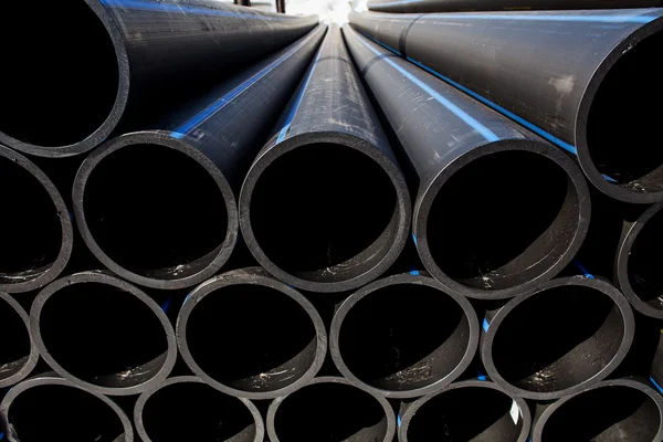 Background of plastic pipes Stock Photo by ©Milazed 87058832