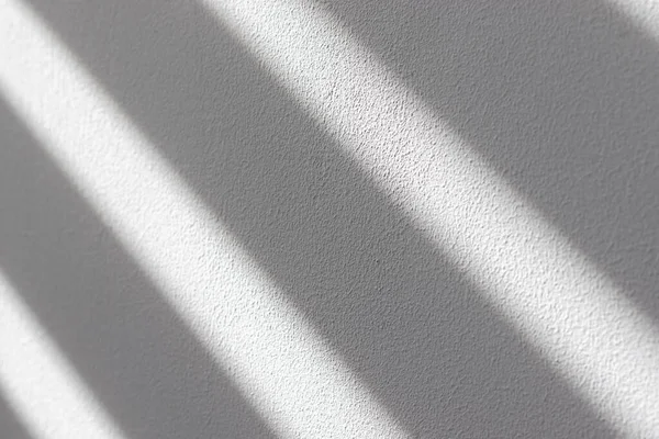 Striped shadow on white wall. Abstract geometric background. - Stock ...