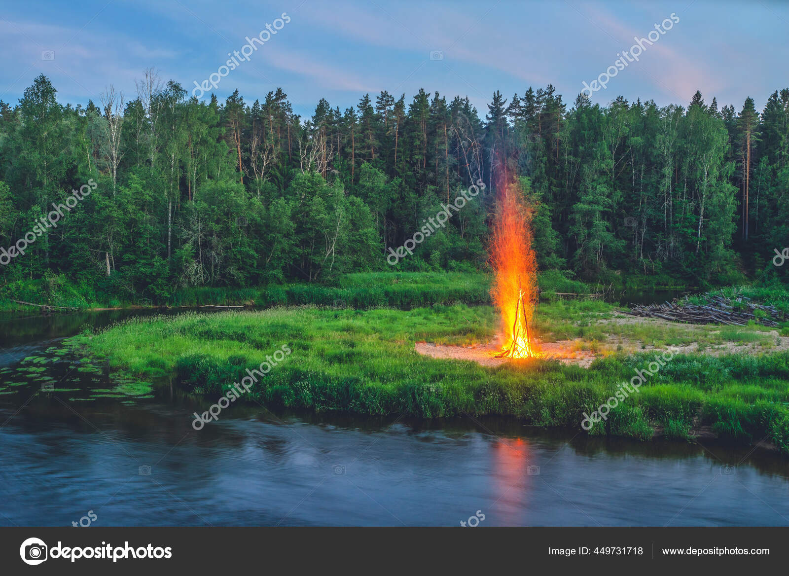 Landscape of forest and river at night. Huge fire. Midsummer. Stock ...