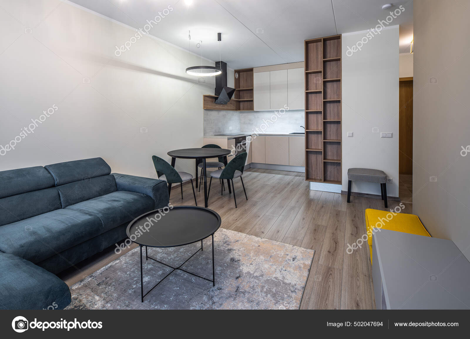 Modern light interior of studio apartment. Kitchen. Living room ...