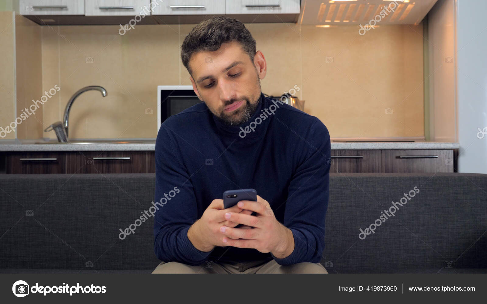 Man uses smartphone typing message in messenger writing post on social ...