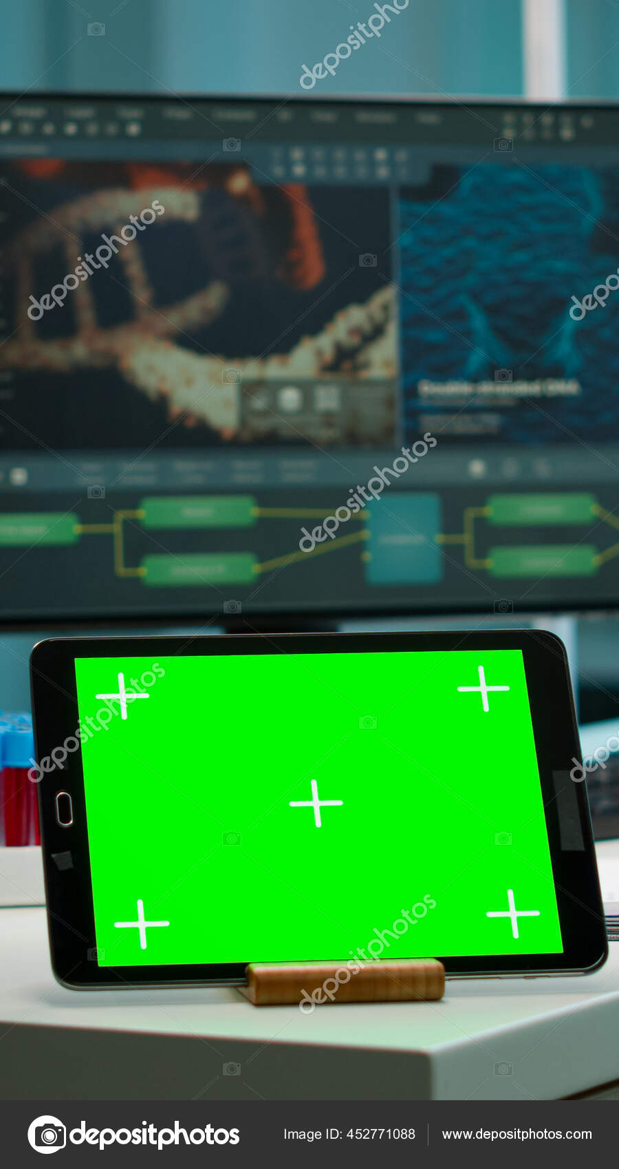 Display tablet with green screen, mock up on template placed on desk ...