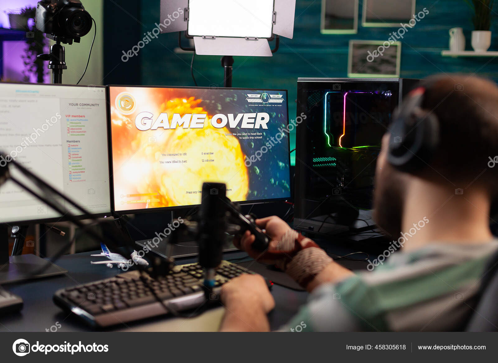 Back view of upseted streamer playing game competition — Stock Photo ...