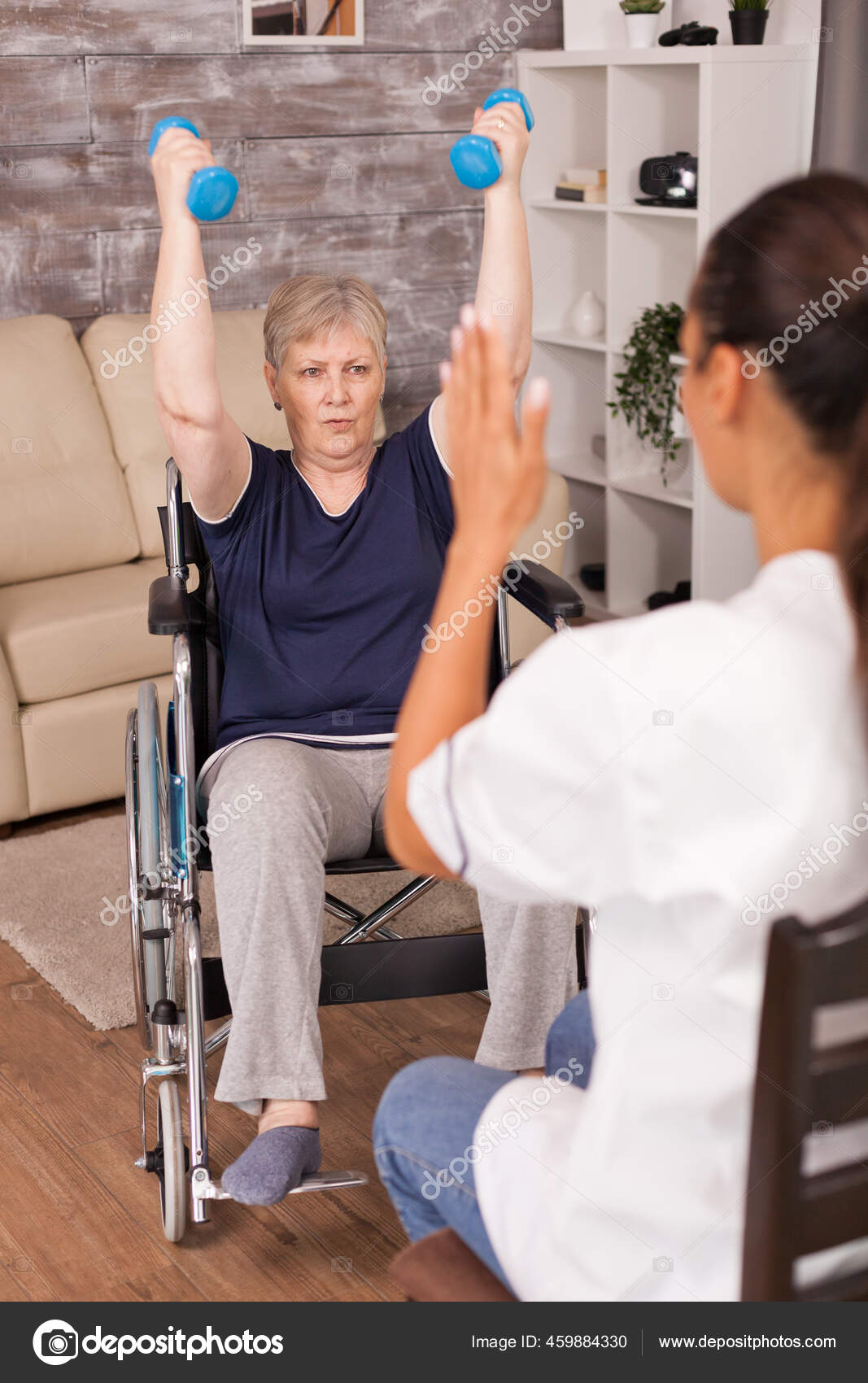 Nurse explaining dumbbell exercises — Stock Photo © DragosCondreaW ...