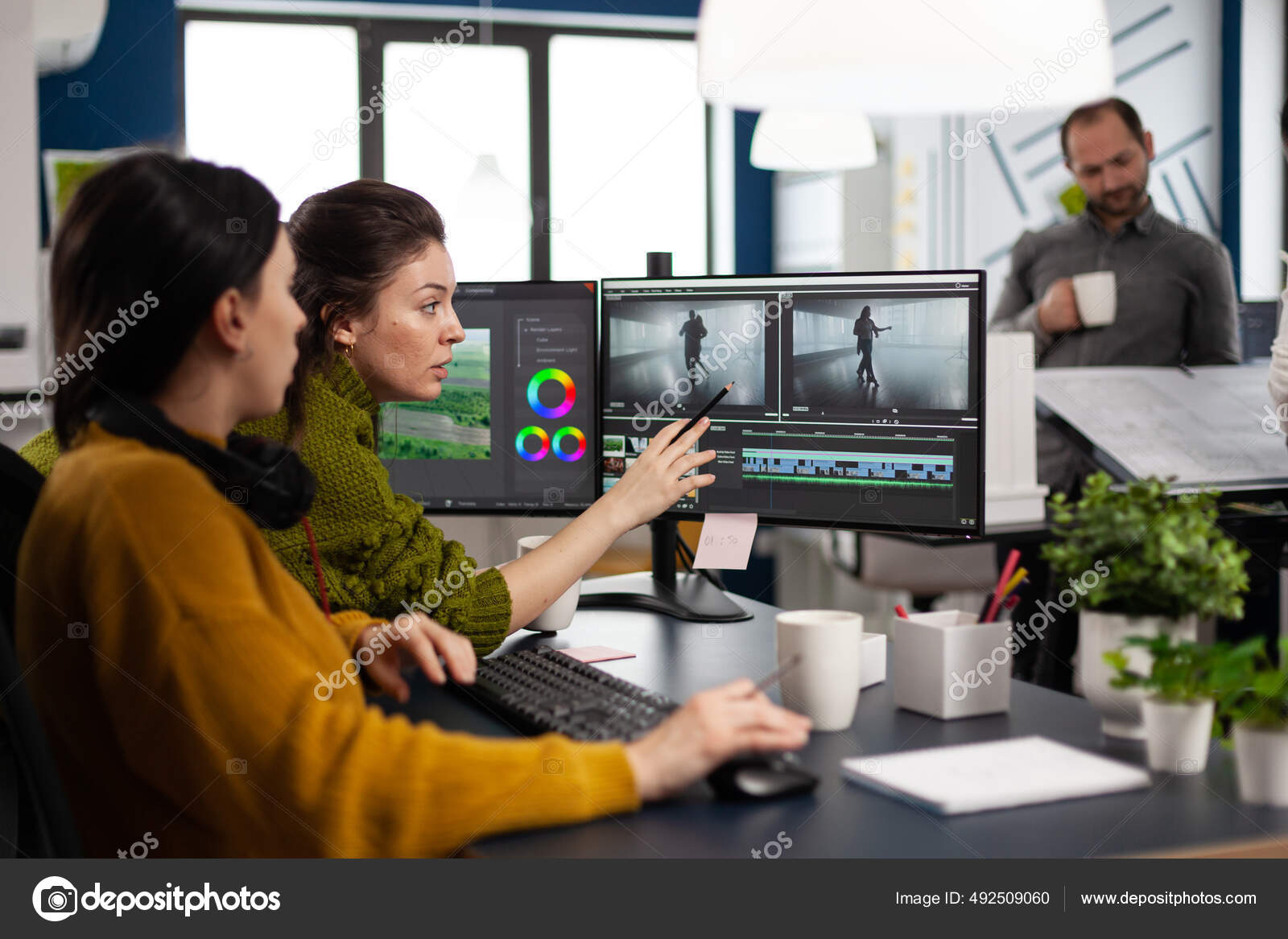 Team of editors women working with modern studio post production ...