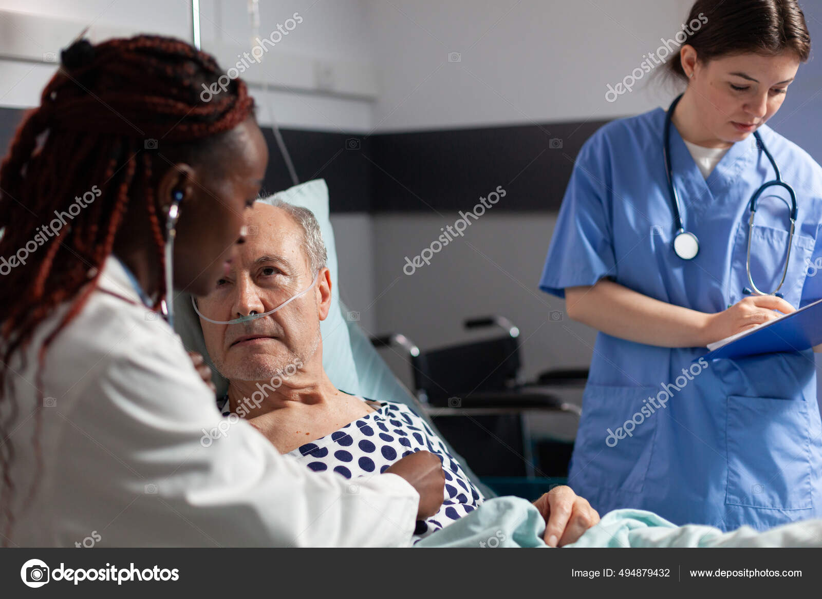 African american cardiologist checking examining senior patient heart ...