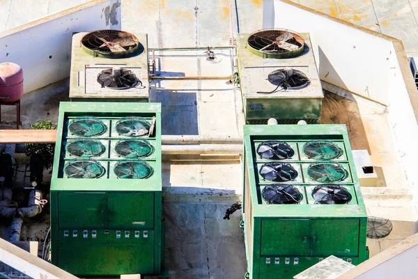 Old ventilation system on the roof of an industrial building - Stock ...