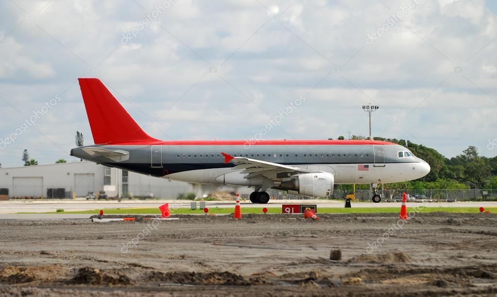 Passenger jet side view — Stock Photo © icholakov01 #63670425
