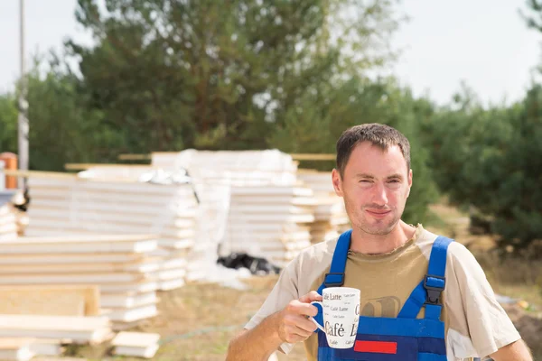 Workman taking a right angle measurement — Stock Photo © Vaicheslav ...