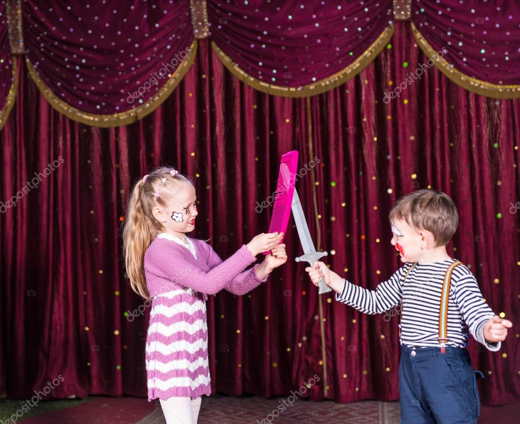 Young Clowns Having Prop Sword Fight on Stage — Stock Photo ...