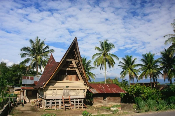Traditional Batak house on Samosir island, Sumatra, Indonesia Stock ...