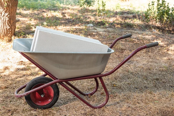 Concrete wheelbarrow Stock Photos, Royalty Free Concrete wheelbarrow ...