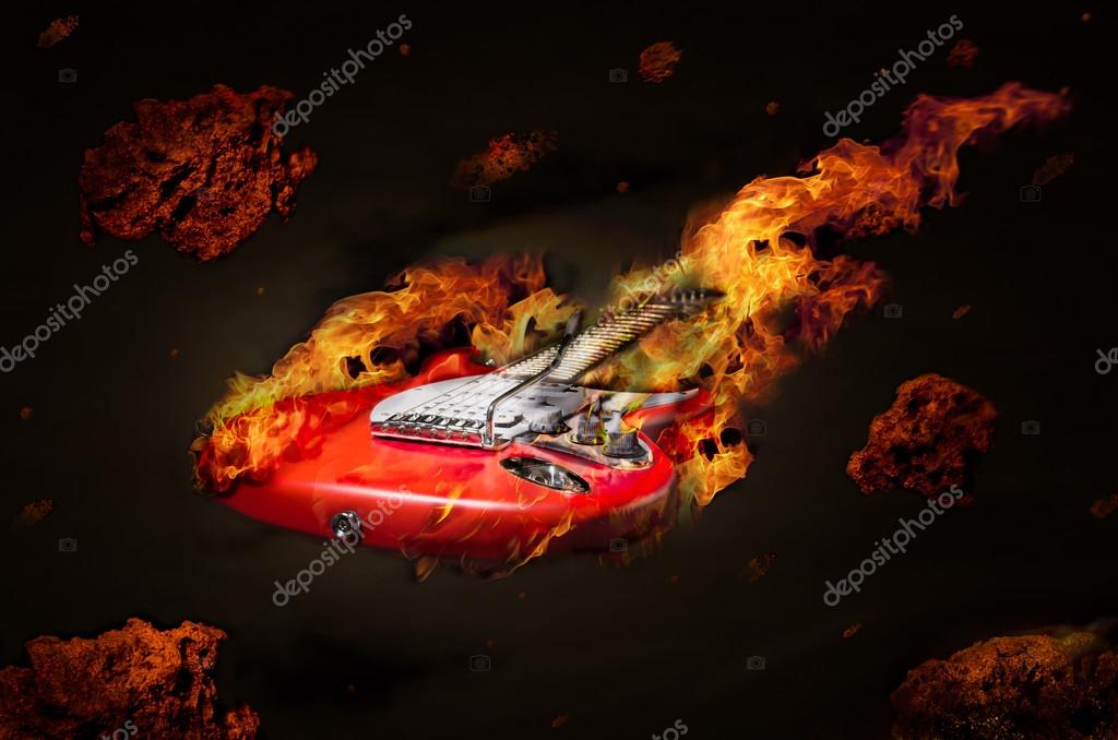 Burning guitar flying in space among meteorites Stock Photo by ...