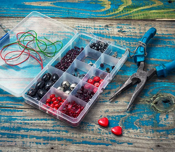 Hobby crafts of beads. Stock Photo by ©Nikolay_Donetsk 148238705