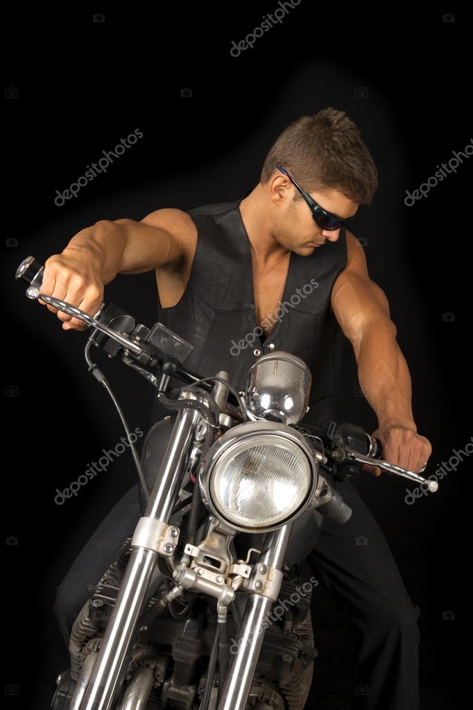 Man sitting on his motorcycle — Stock Photo © alanpoulson #56351555