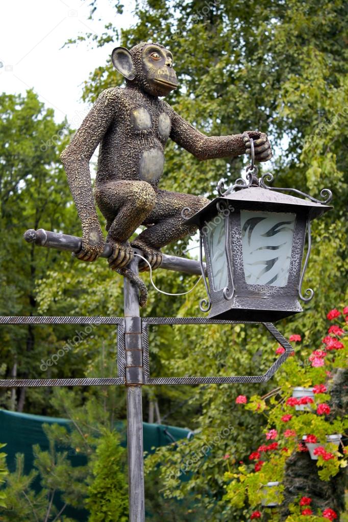 Lantern monkey statue in the park. — Stock Photo © felker #109719464