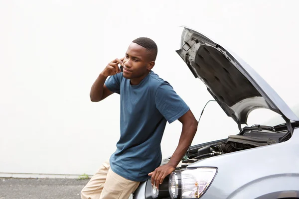 Man calls for help with a stalled car - Stock Image - Everypixel
