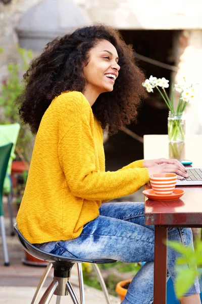 Smiling young lady at coffee shop - Stock Image - Everypixel
