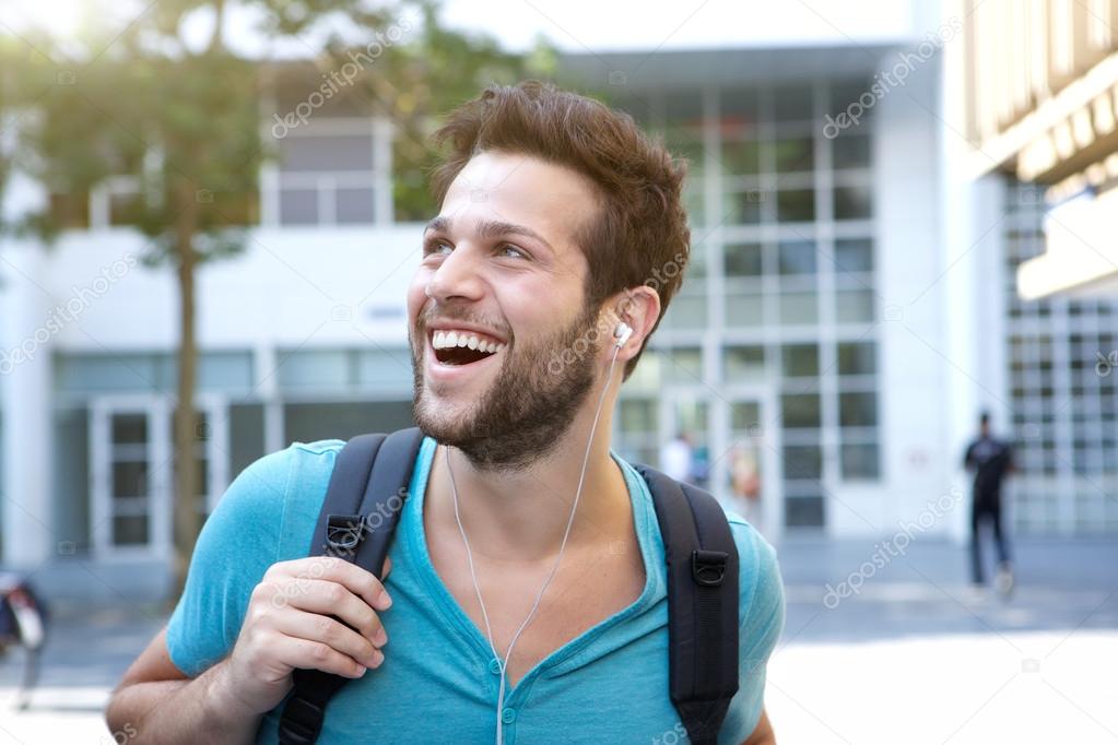 Male college student walking on campus Stock Photo by ©mimagephotos ...