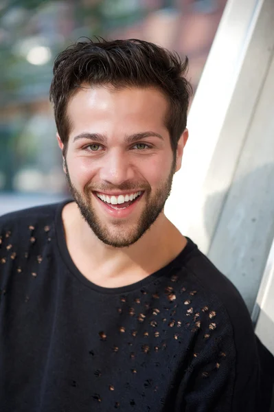 Smiling young man with beard - Stock Image - Everypixel