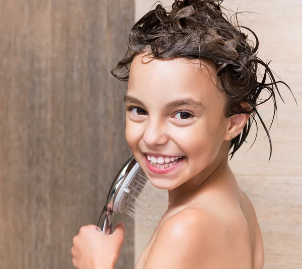 Child in shower Stock Photo by ©VaLiza 79060068
