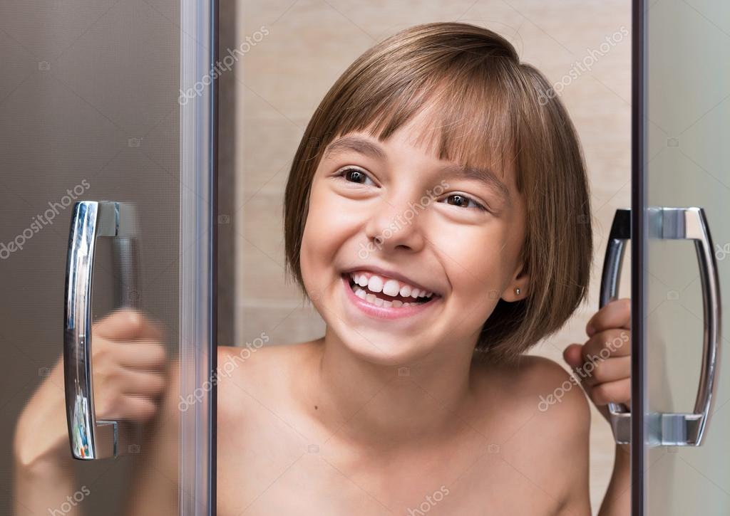 Child in shower Stock Photo by ©VaLiza 79059320