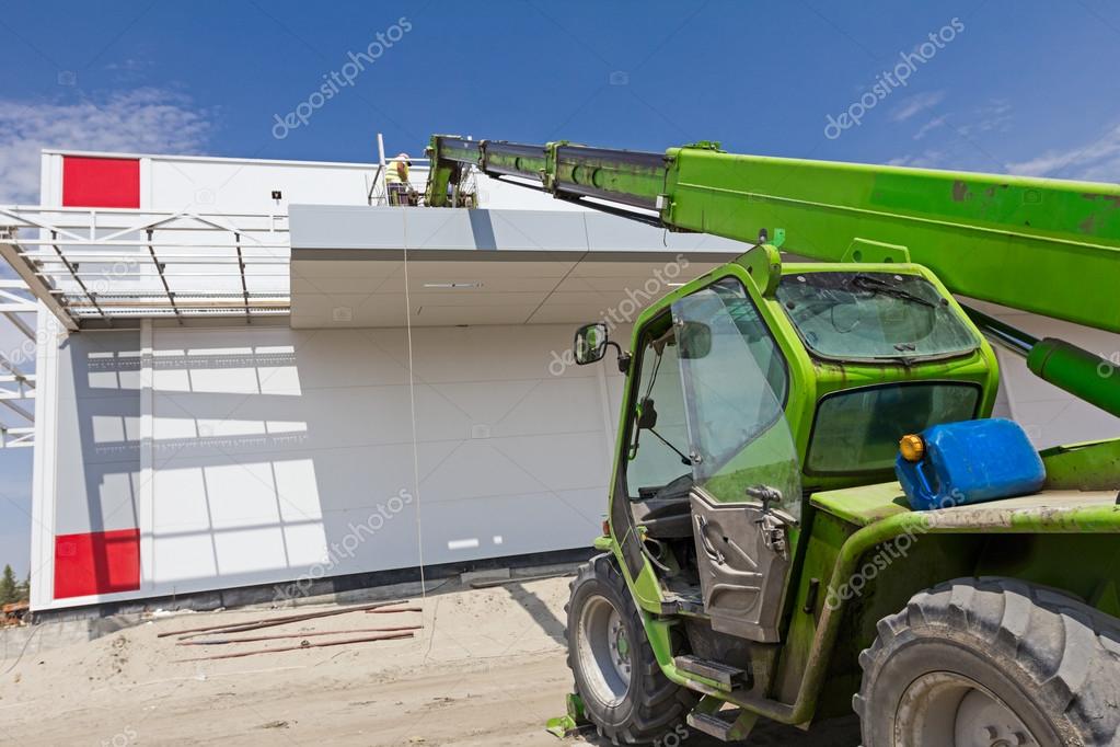 High elevated team of workers on construction site. — Stock Photo ...