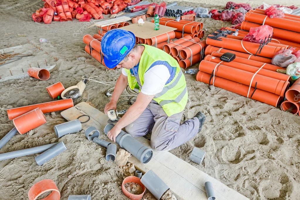 Set up sewer pipe to right length — Stock Editorial Photo © roman023 ...
