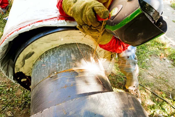 Close up shot welder until welding, sparks flying around. — Stock Photo ...