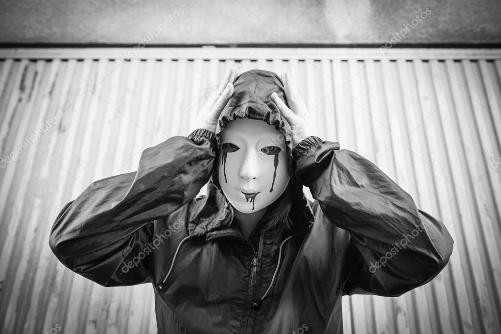 Female masked killer — Stock Photo © celiafoto #56543747