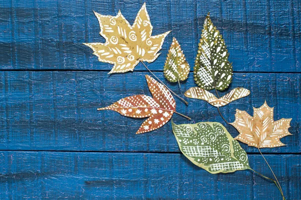 Hand painted on dry autumn leaves - Stock Image - Everypixel