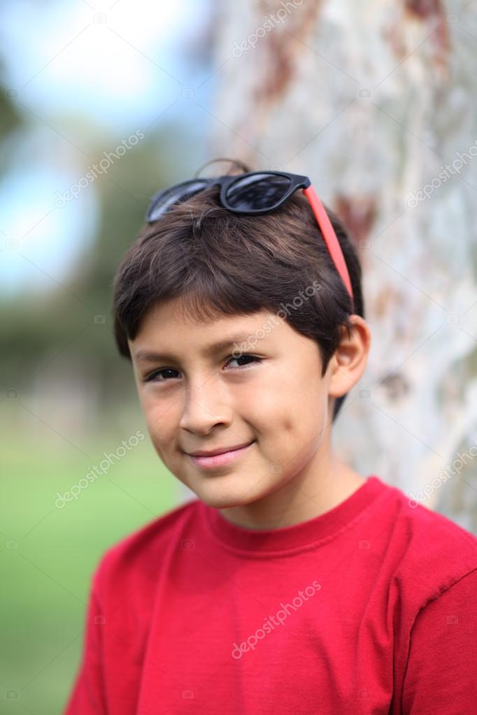 Boy in the park — Stock Photo © dmediapro #52420593