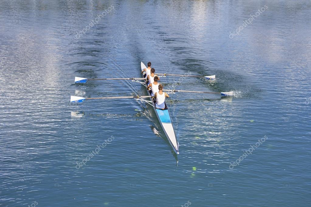 Four men rowing — Stock Photo © smuki #58263975
