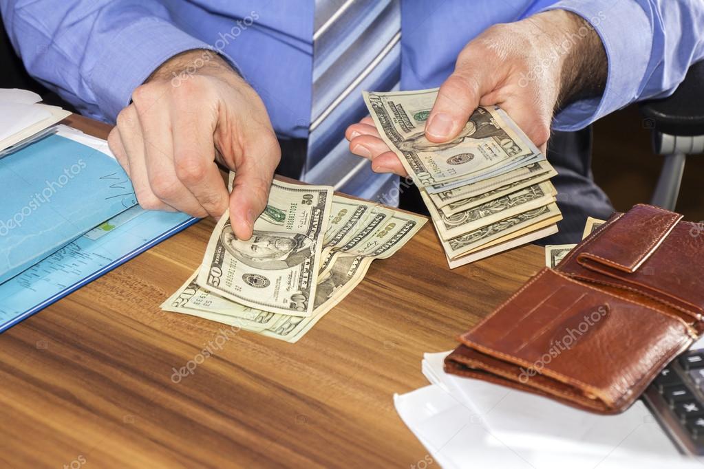Counting dollars banknotes Stock Photo by ©smuki 69222951