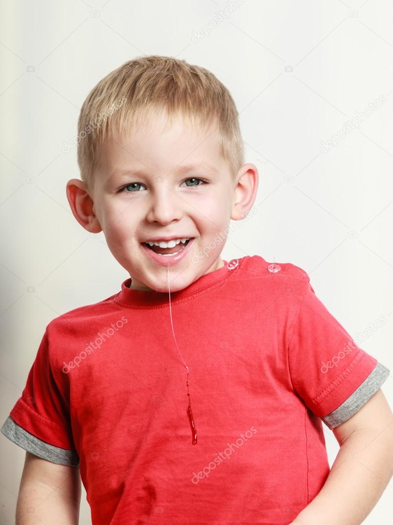 Little boy have fun and drool. Stock Photo by ©Voyagerix 108180874