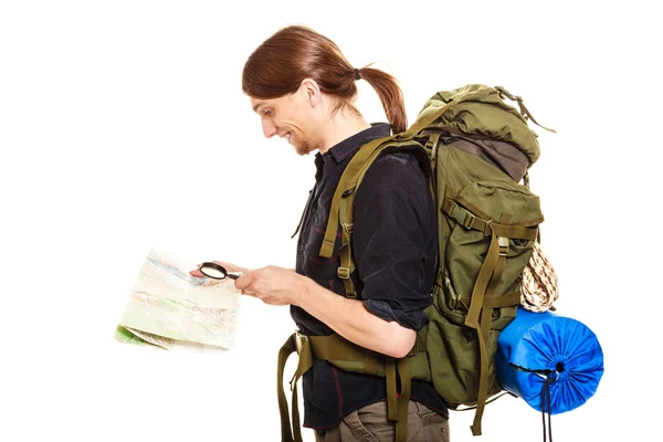 Man tourist reading map Stock Photo by ©Voyagerix 98280626