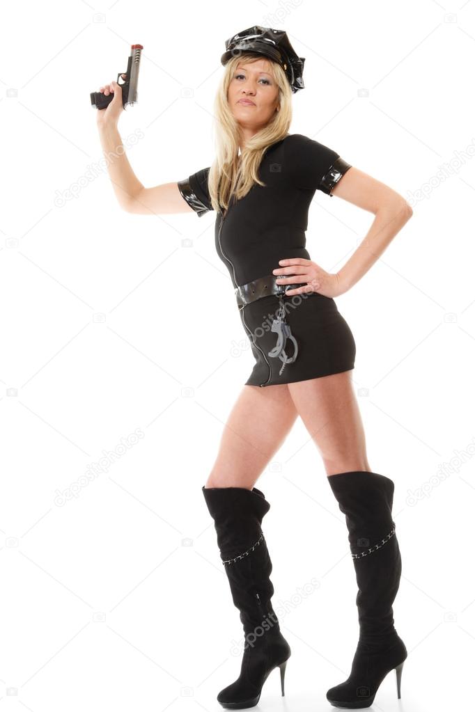 Policewoman cop with gun Stock Photo by ©Voyagerix 112005368