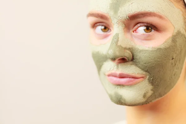 Woman face with green clay mud mask - Stock Image - Everypixel