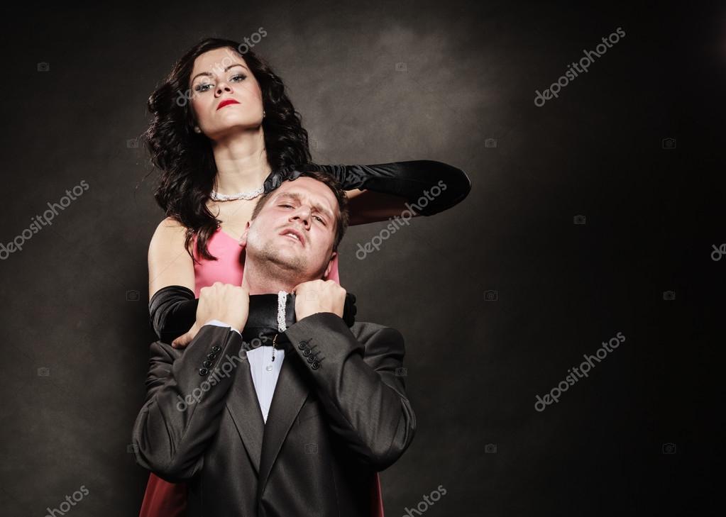 Sexy female controling her guy. — Stock Photo © Voyagerix #64718703