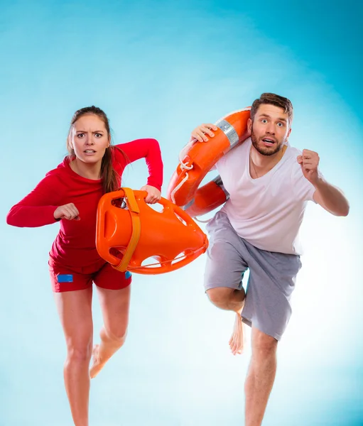 Lifeguard running with equipment Stock Photos, Royalty Free Lifeguard ...
