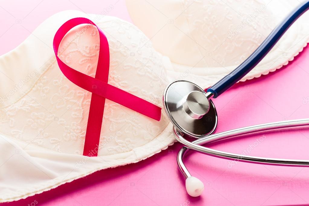 Pink ribbon, stethoscope on bra Stock Photo by ©Voyagerix 66166269
