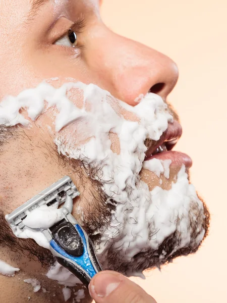 Man shaving with razor - Stock Image - Everypixel