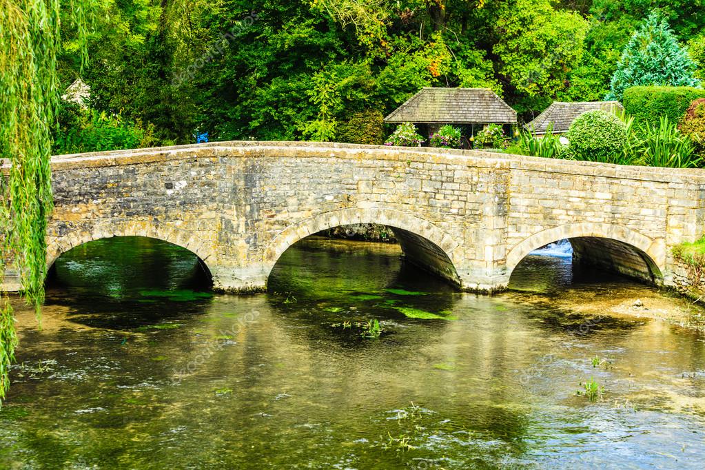 Old stone bridge Stock Photo by ©Voyagerix 77887024