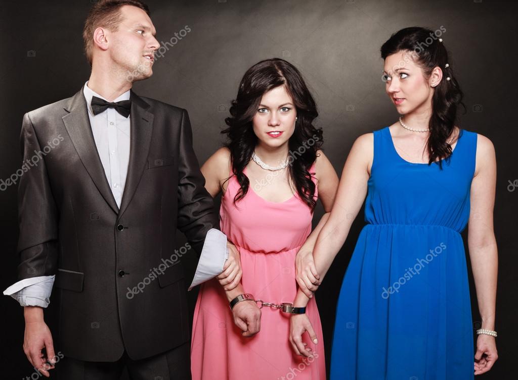 Love triangle, two women and one man — Stock Photo © Voyagerix #82409016