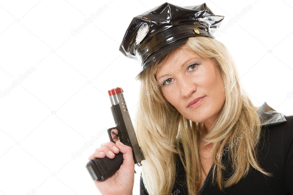 Policewoman cop with gun Stock Photo by ©Voyagerix 86358946