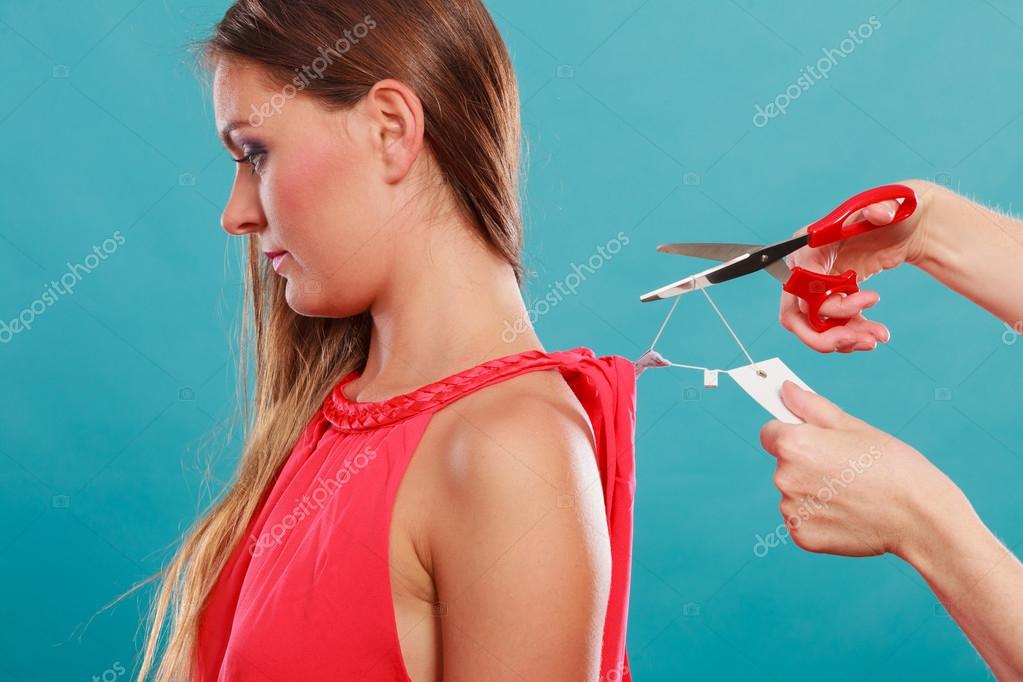 Woman cutting off removing label board price tag. Stock Photo by ...