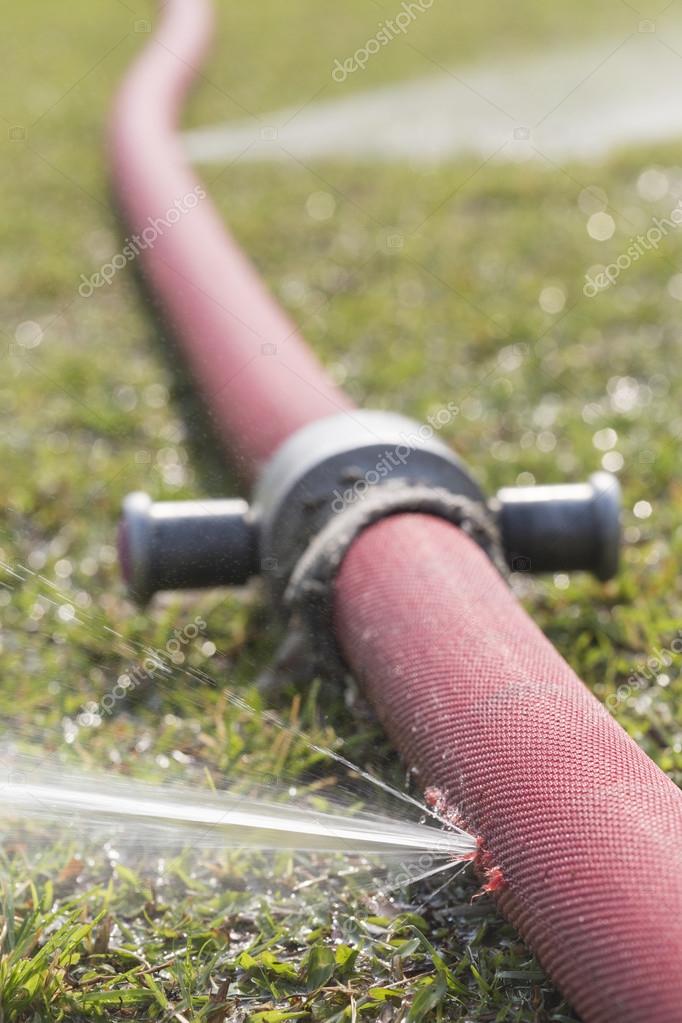 Water leaking from hole in a hose Stock Photo by ©toa55 107181634