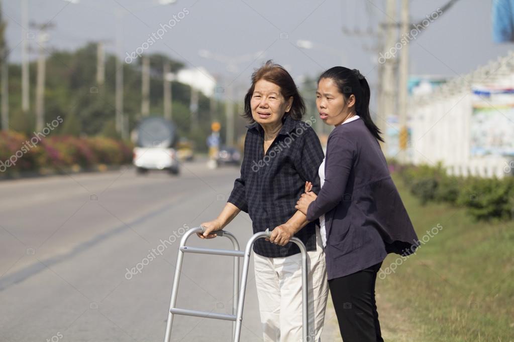 Helping Elderly Cross The Street