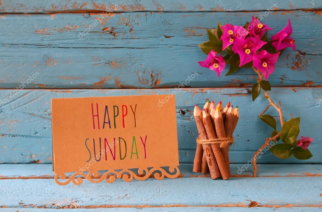 Vintage card with phrase: happy sunday and stack of wooden colorful ...